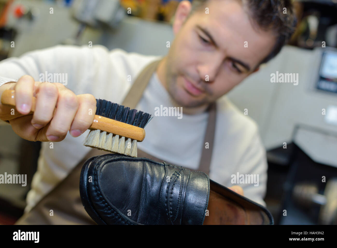 brushing a shoe Stock Photo - Alamy