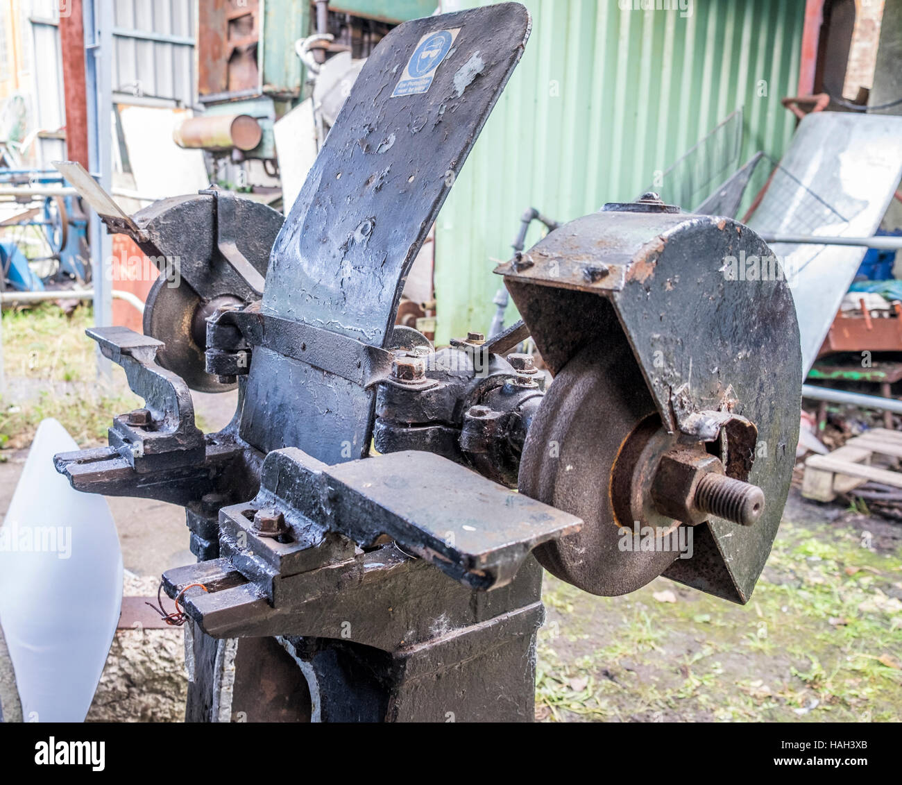A grinding machine wheel in a workshop Stock Photo - Alamy
