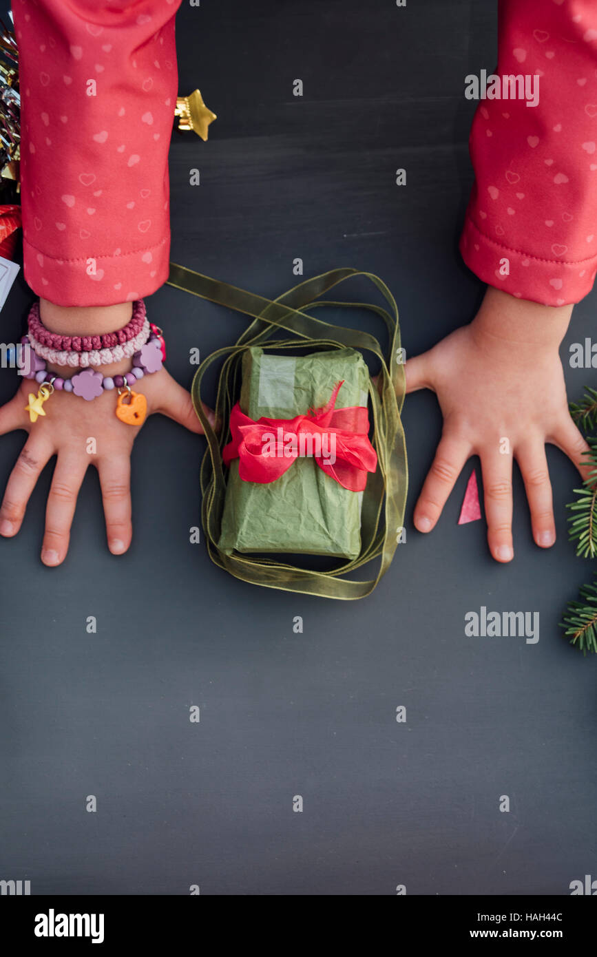 Girl with a green gift Stock Photo - Alamy