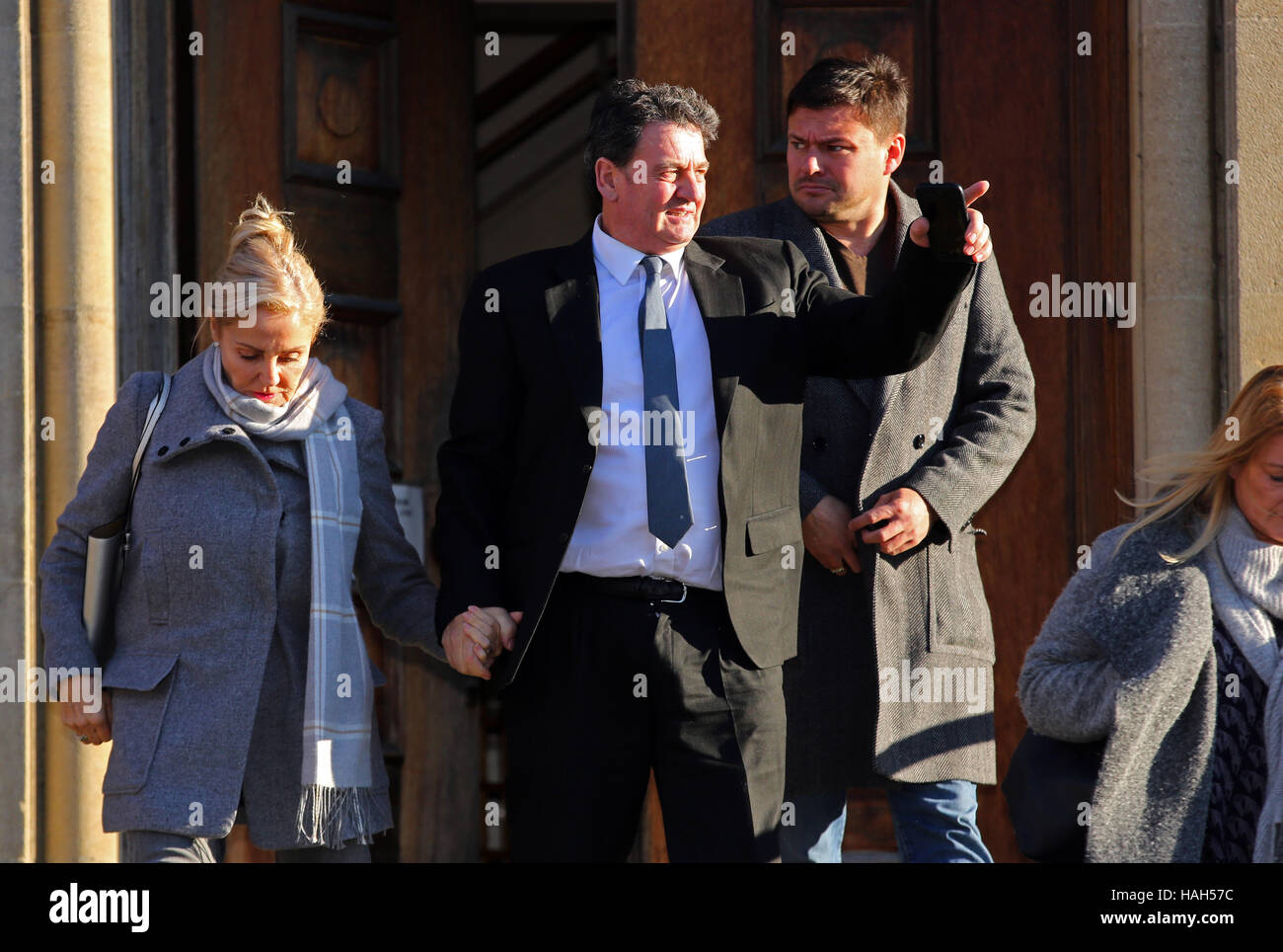 Paul Price (centre), the stepfather of model Katie Pric, leaving ...