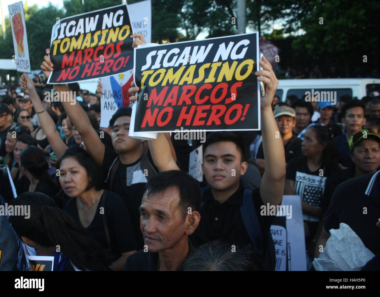 Filipino protesters participate in a rally at the People Power Monument ...
