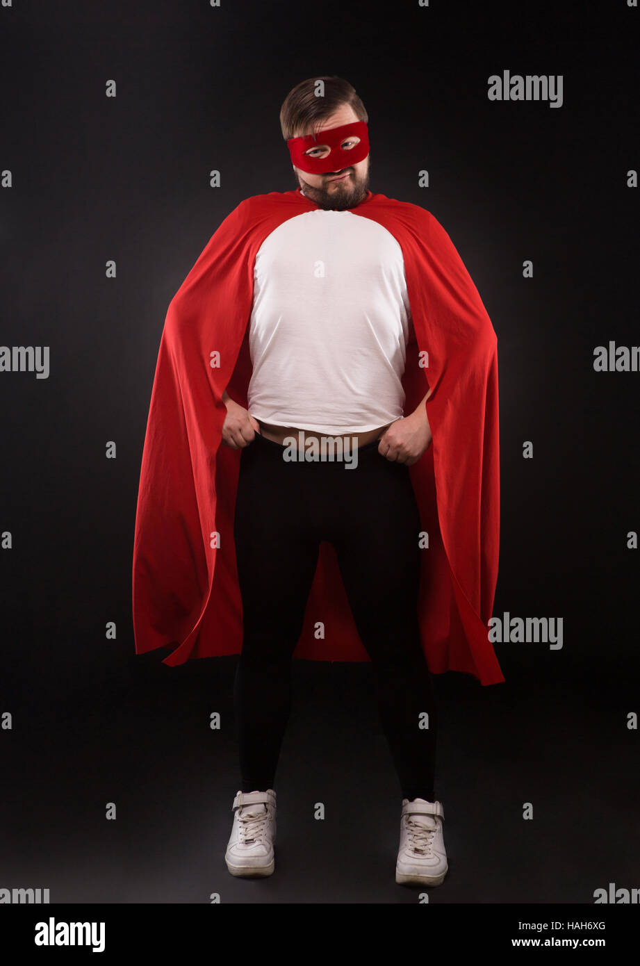 Young super hero man in studio Stock Photo - Alamy
