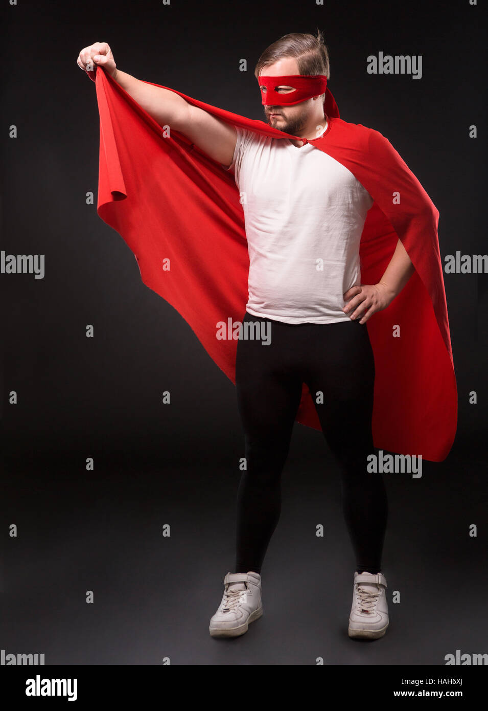 Young super hero man in studio Stock Photo - Alamy