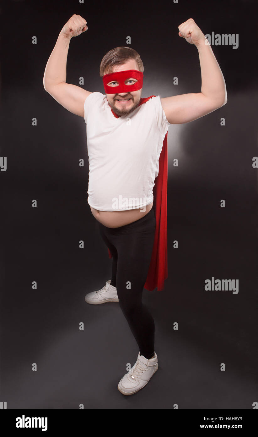 Young super hero man in studio Stock Photo - Alamy