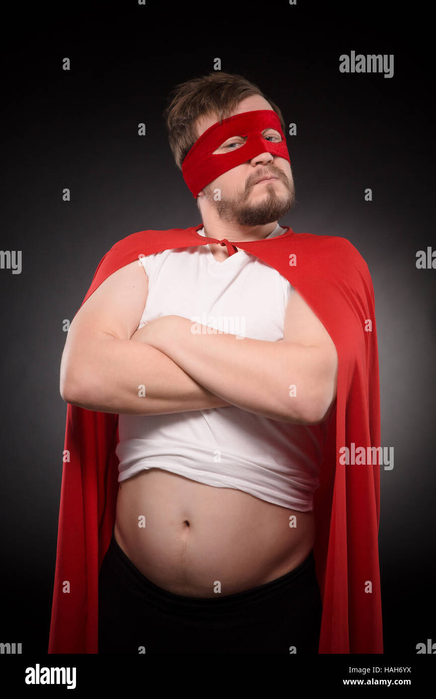 Young super hero man in studio Stock Photo - Alamy