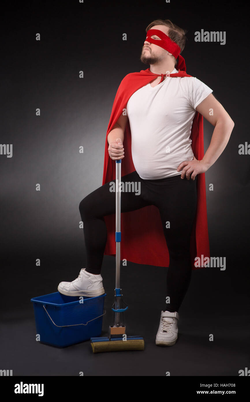 Super hero with cleaning equipment Stock Photo - Alamy