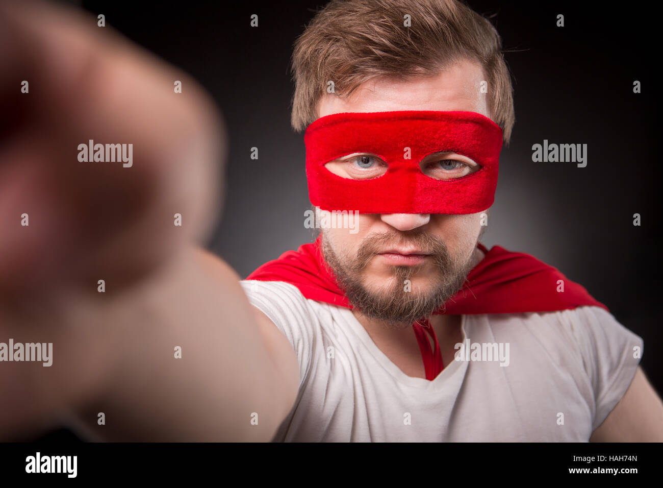 Super hero man making photos Stock Photo - Alamy