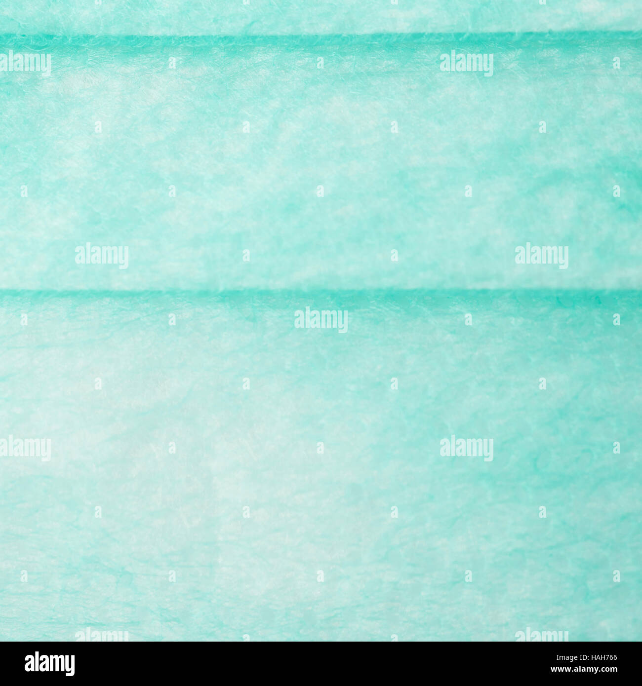 Green medical surgical protective mask texture as abstract background ...