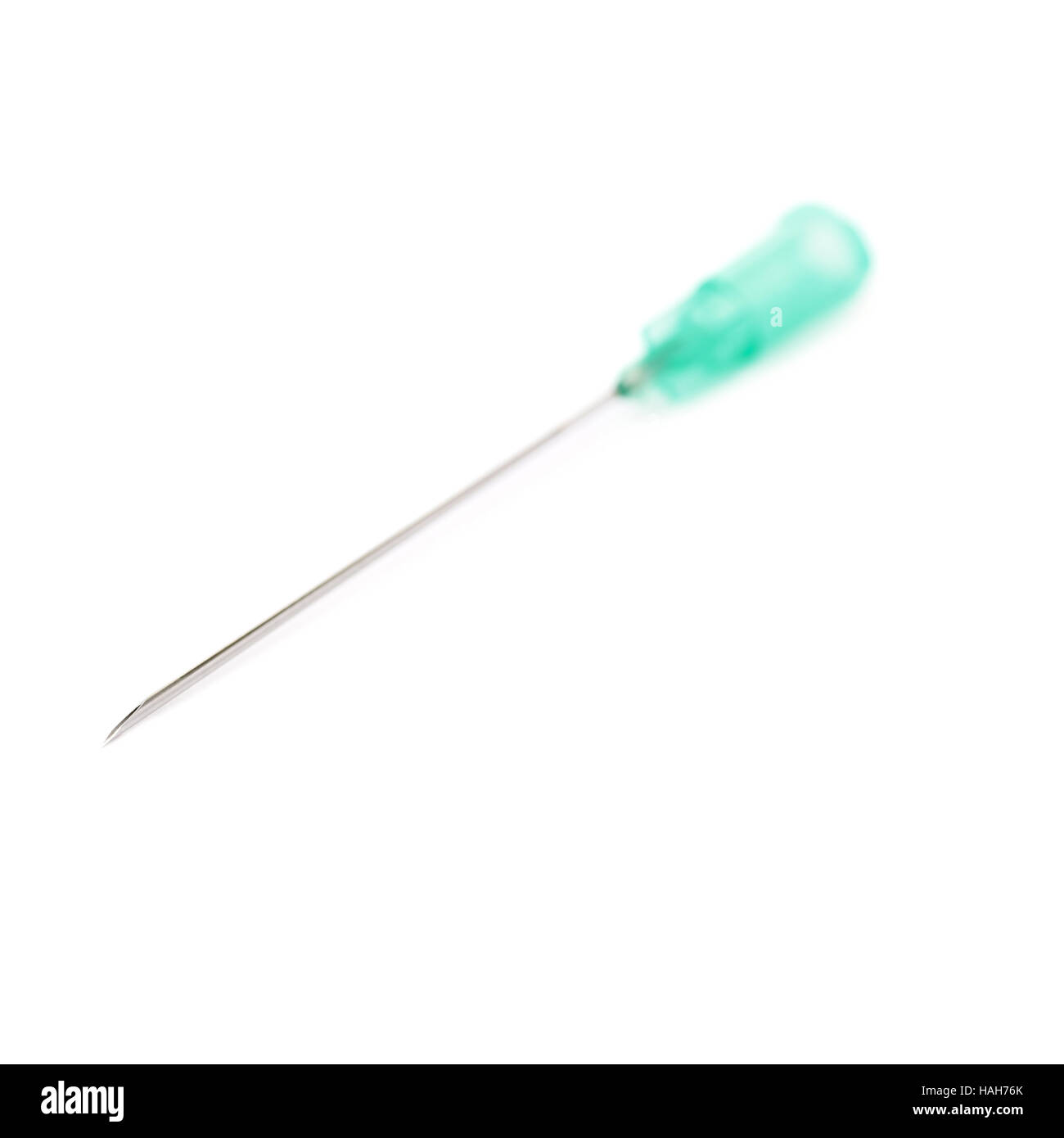 Medical syringe needle isolated over white background Stock Photo - Alamy