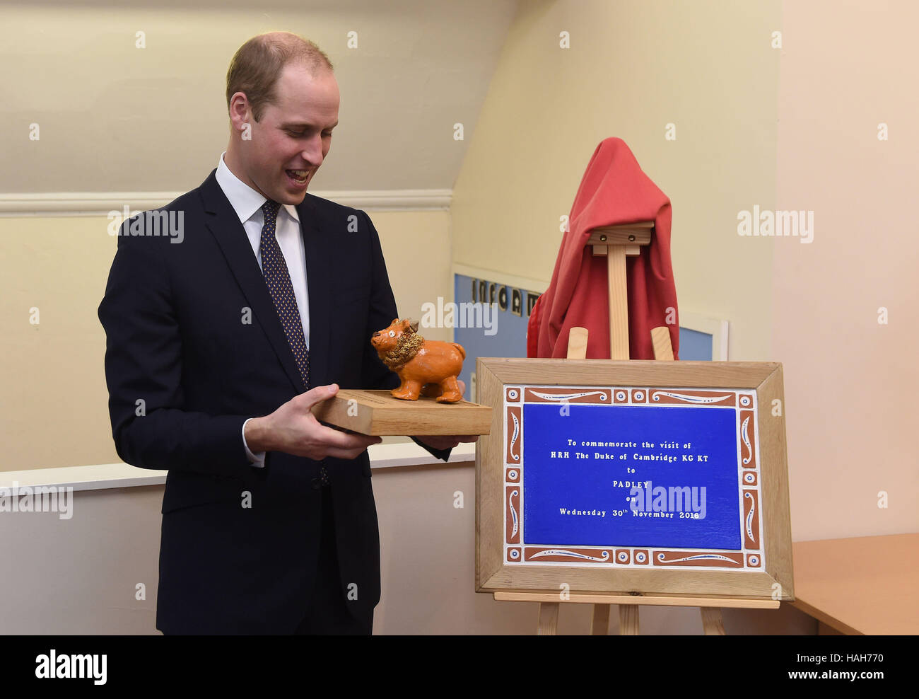 The Duke of Cambridge receives a gift at the end of his visit to Padley ...