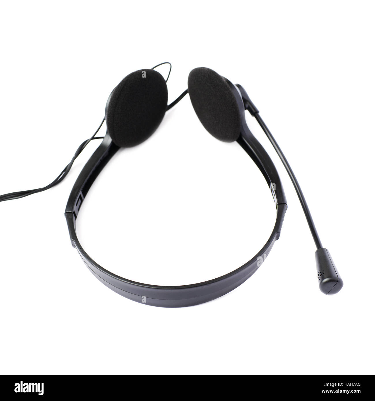 Black computer headset with a microphone isolated over white background ...