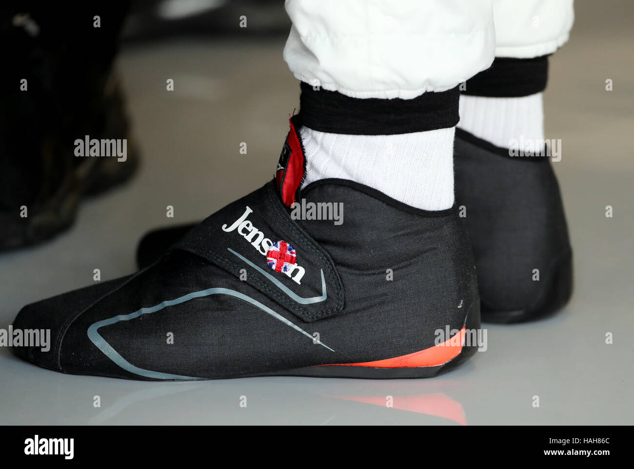 Jenson Button's racing boots during practice at Yas Marina Circuit, Abu ...