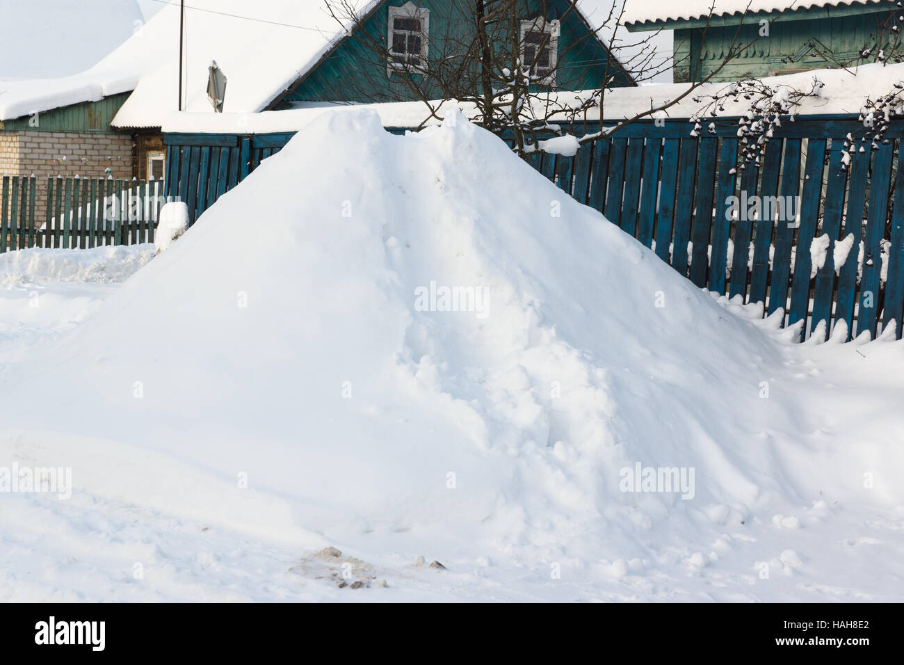 snow slide for small children in the village street in winter Stock ...