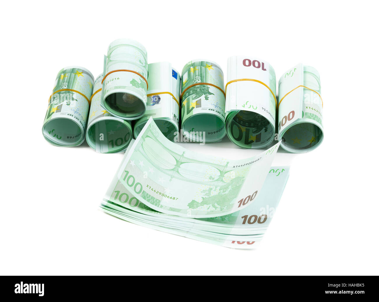 Banknotes 100 euros rolls. Isolate on white Stock Photo - Alamy