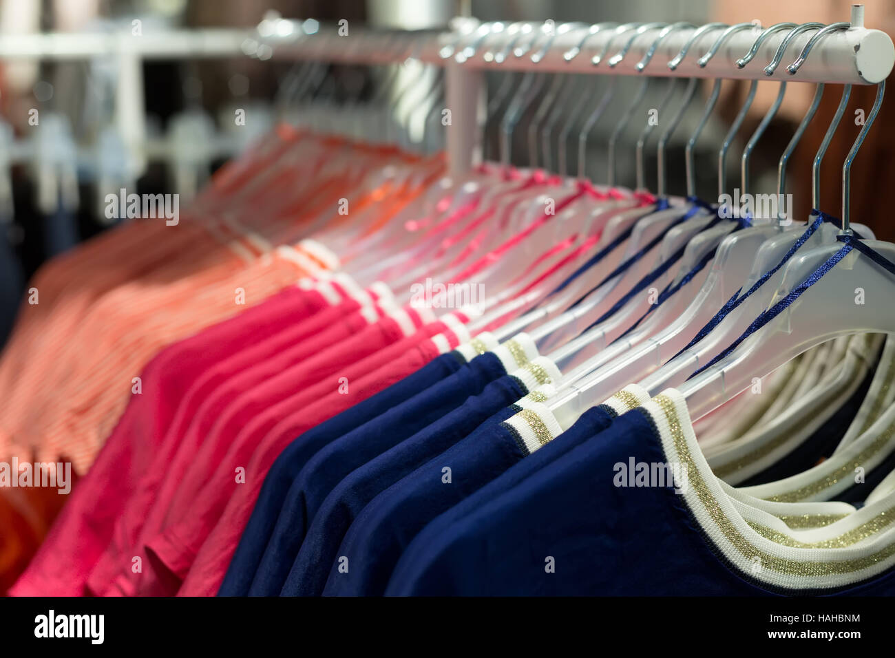 In store on clothes hangers hi-res stock photography and images - Alamy