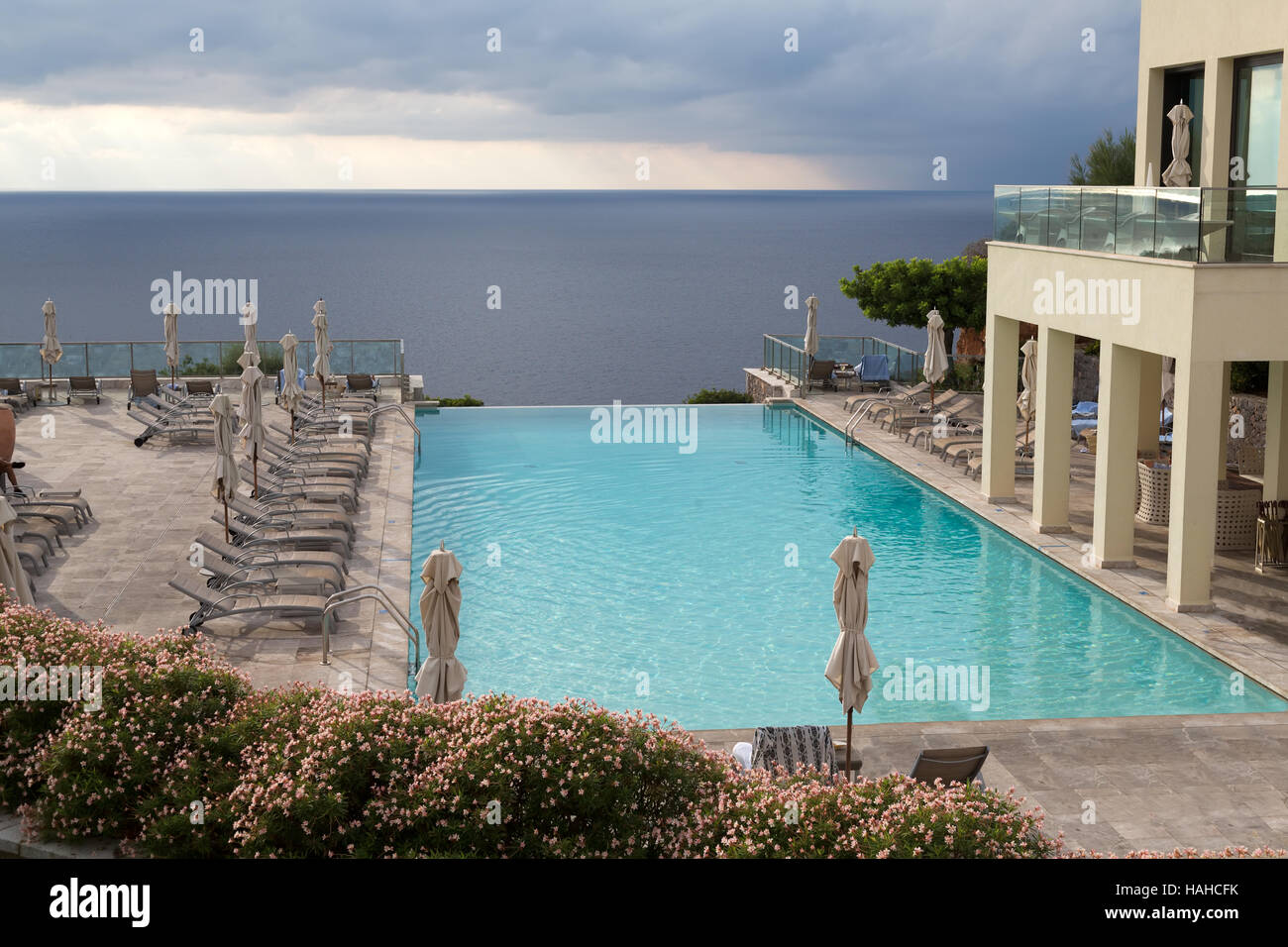 A luxury swimming pool situated with sea view Stock Photo - Alamy