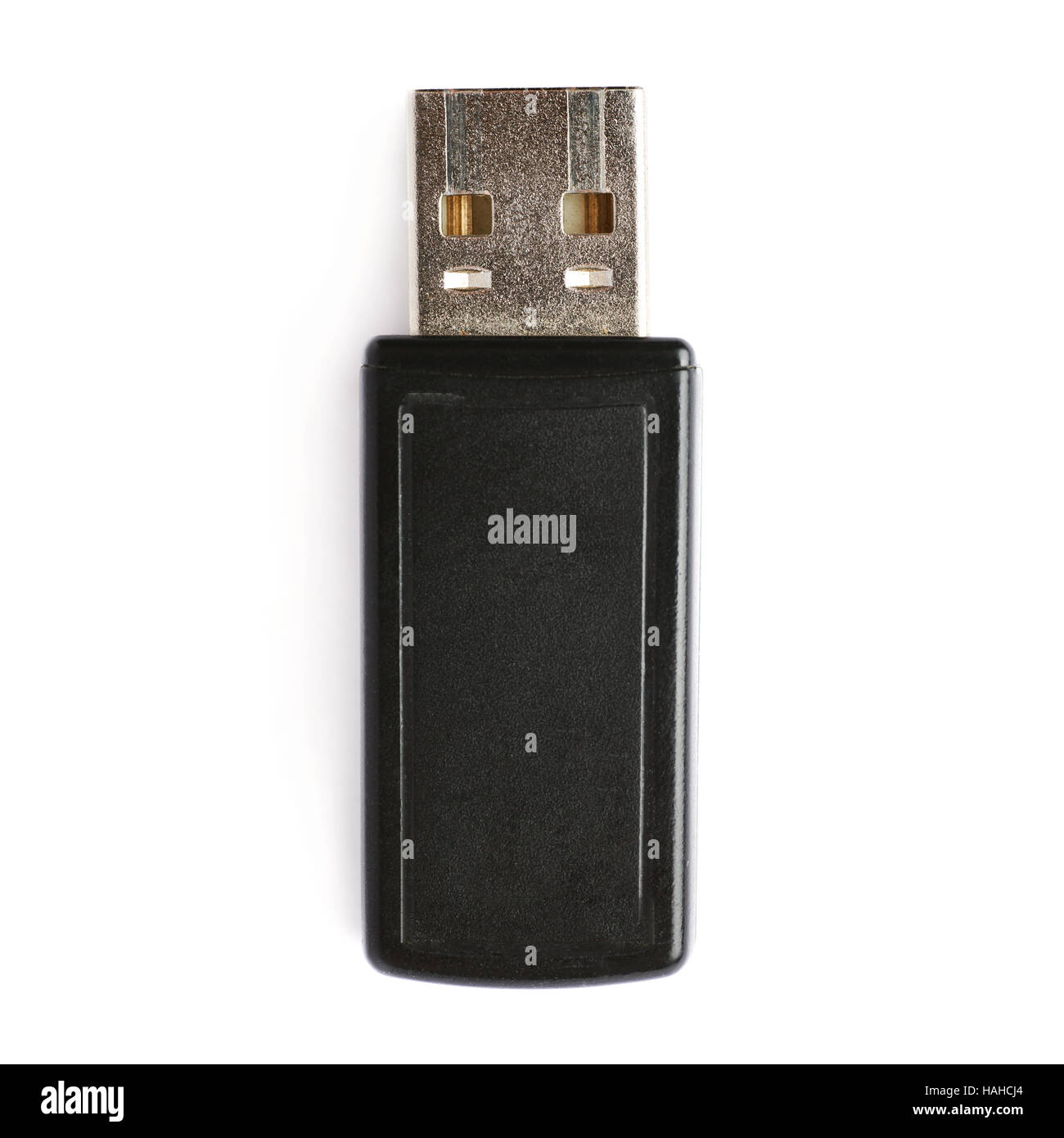 Black flash drive or wireless receiver isolated over white background ...