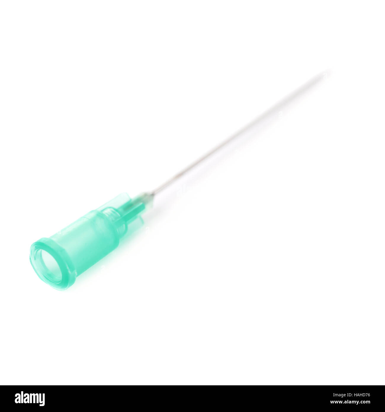 Medical syringe needle isolated over white background Stock Photo - Alamy