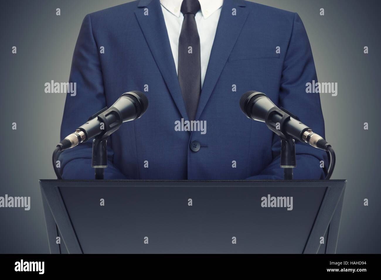 Businessman or politician making speech from behind the pulpit Stock ...
