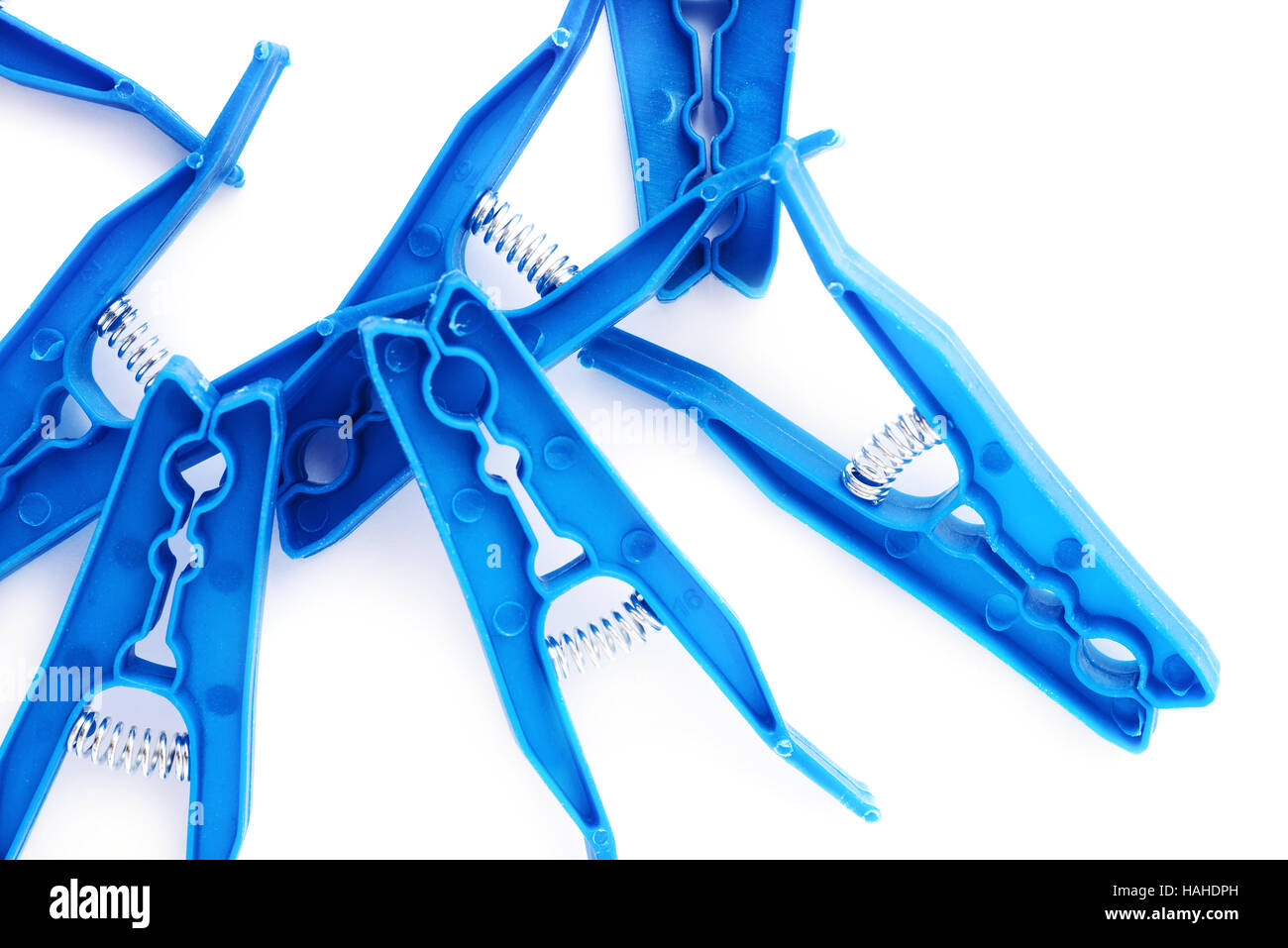 Pile of plastic cloth pegs isolated over white background Stock Photo ...