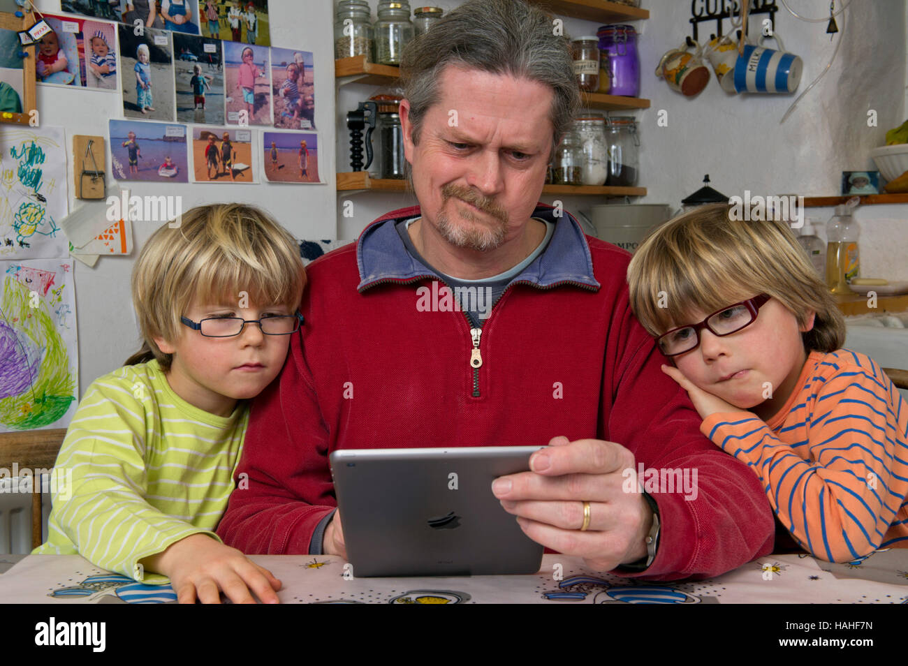 Pete Cross, a single father with his twin boys Ben (left) and Seth ...