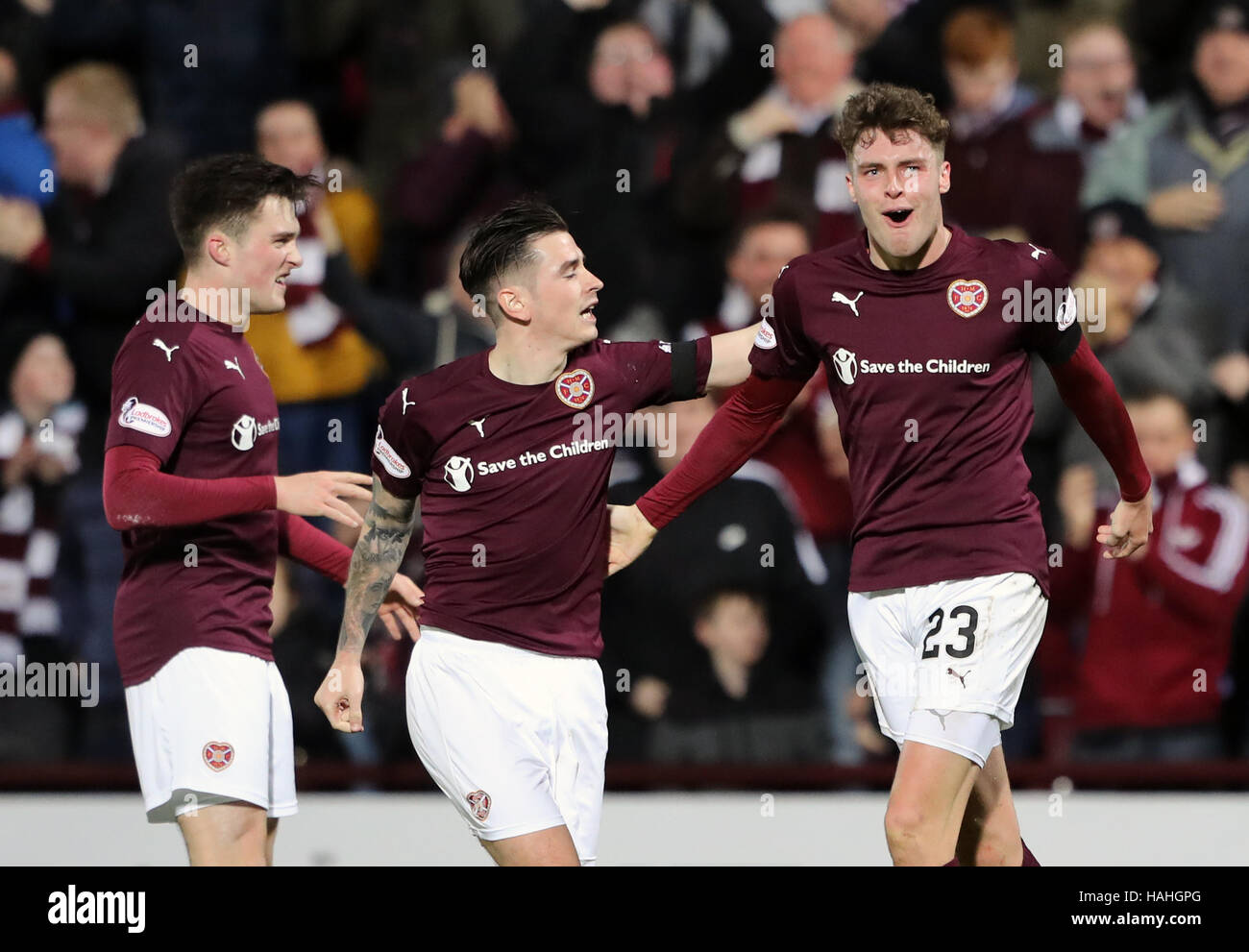 Heart of Midlothian's Robbie Muirhead (right) celebrates scoring his ...