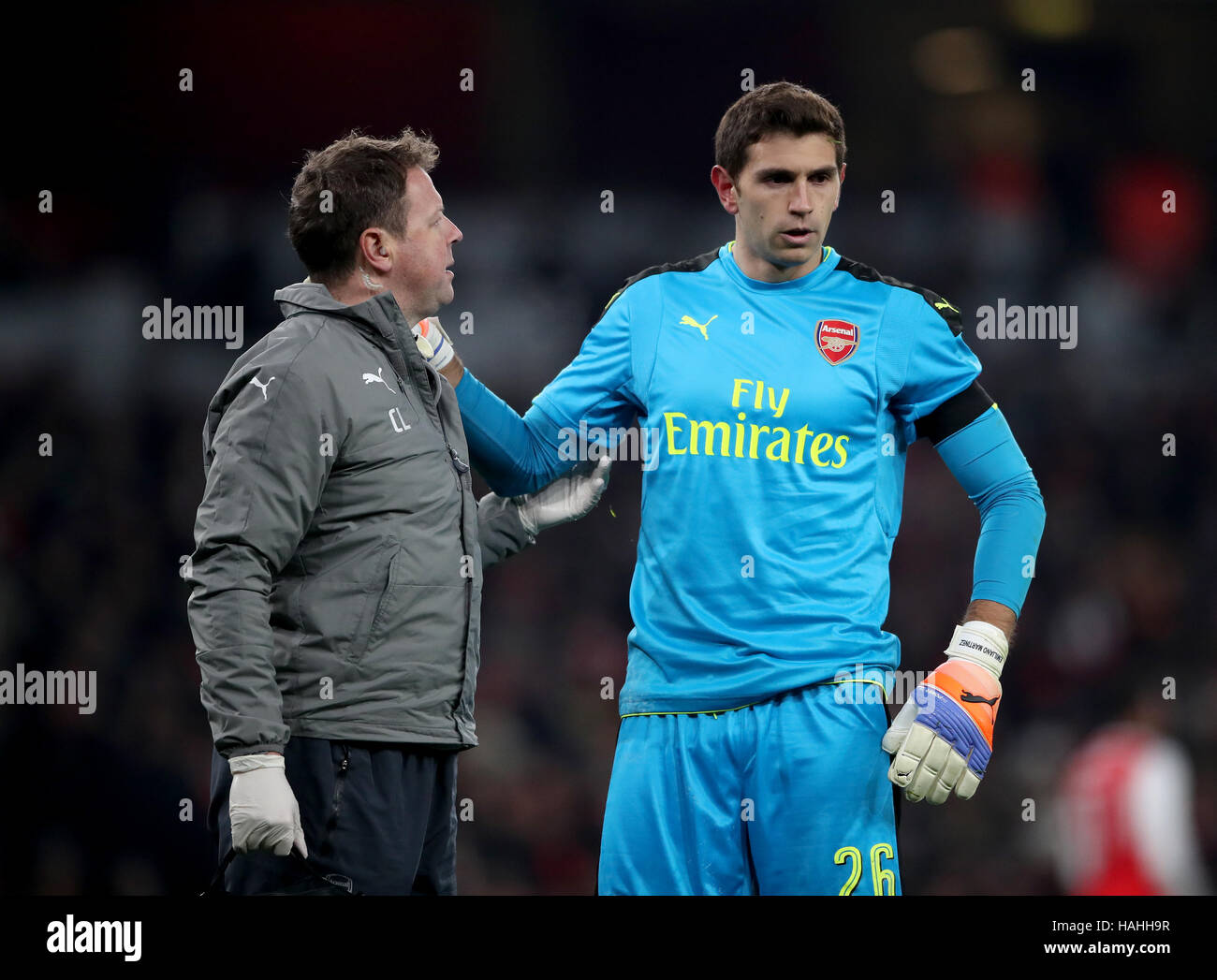 Arsenal goalkeeper Emiliano Martinez (right) with Head of Medical ...