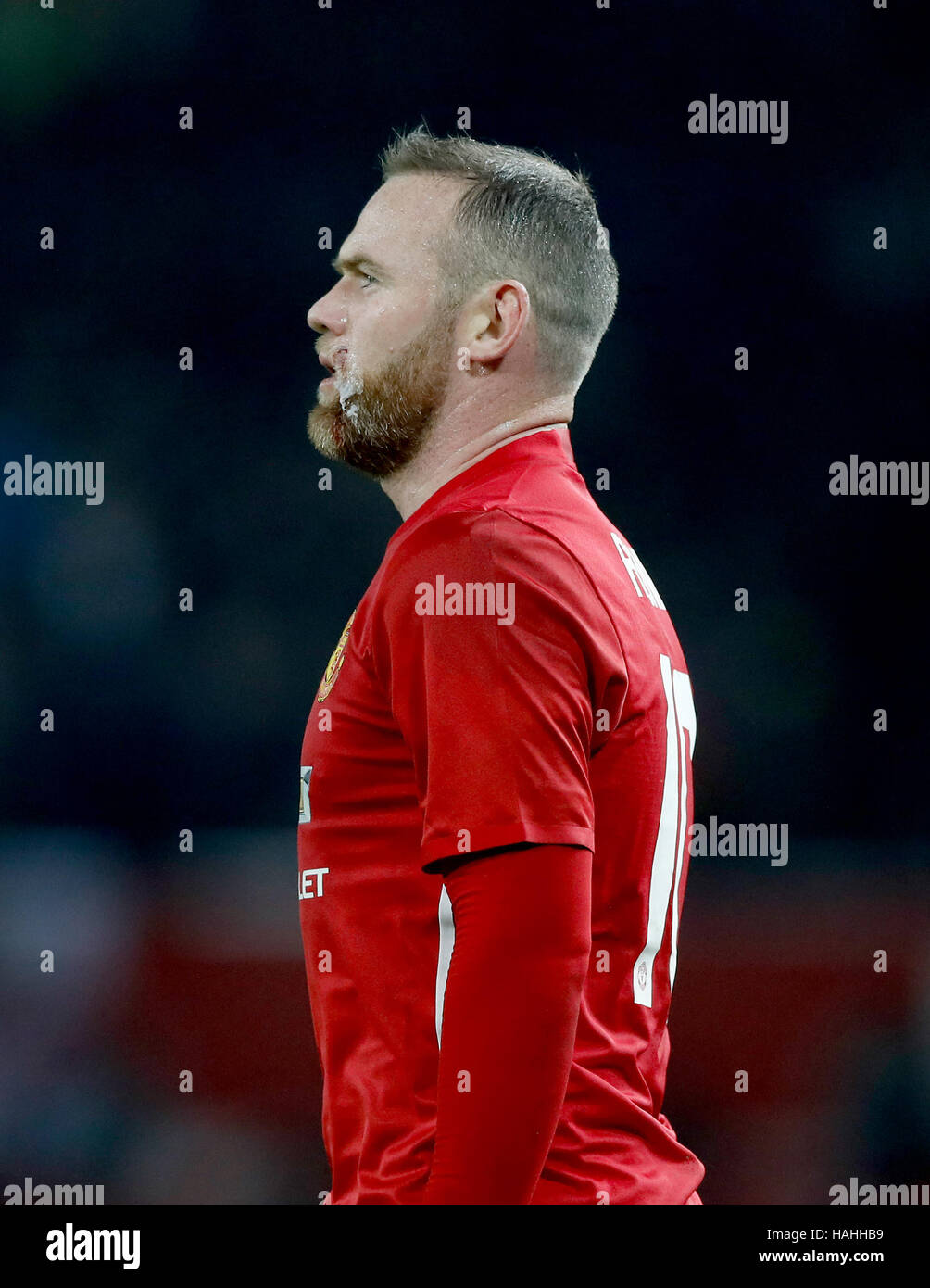 Manchester United's Wayne Rooney after being treated for a cut on his ...