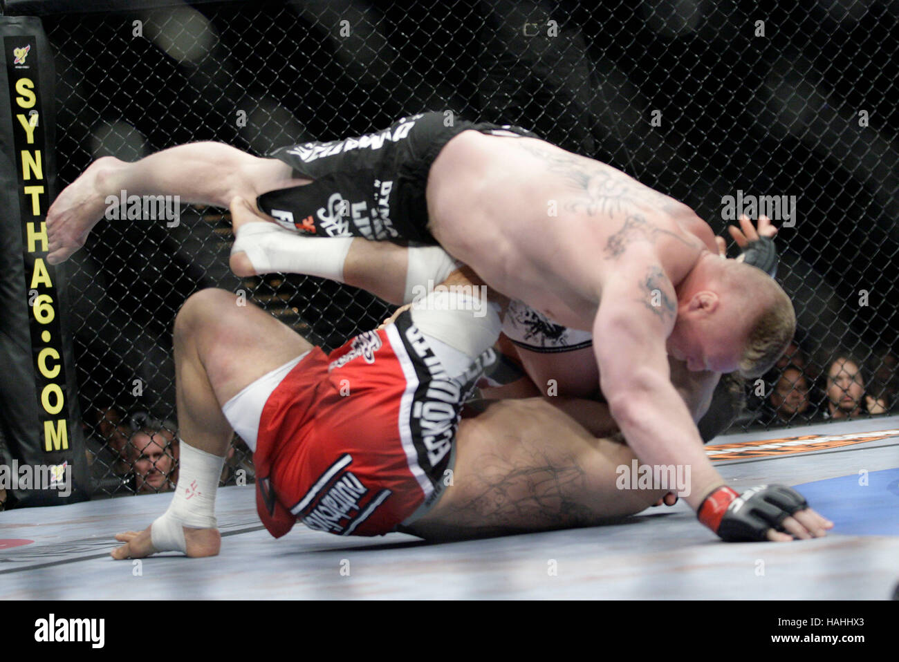 Brock Lesnar, top, fights Frank Mir during UFC 100 at the Mandalay Bay ...