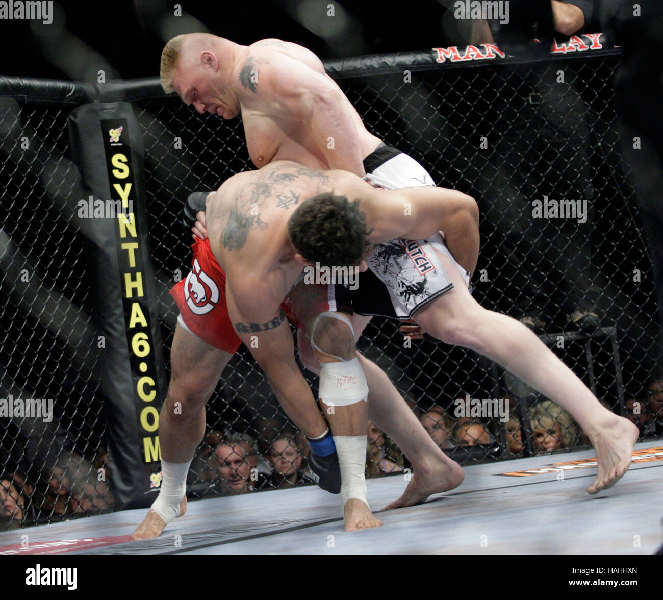 Brock Lesnar, right, fights Frank Mir during UFC 100 at the Mandalay ...
