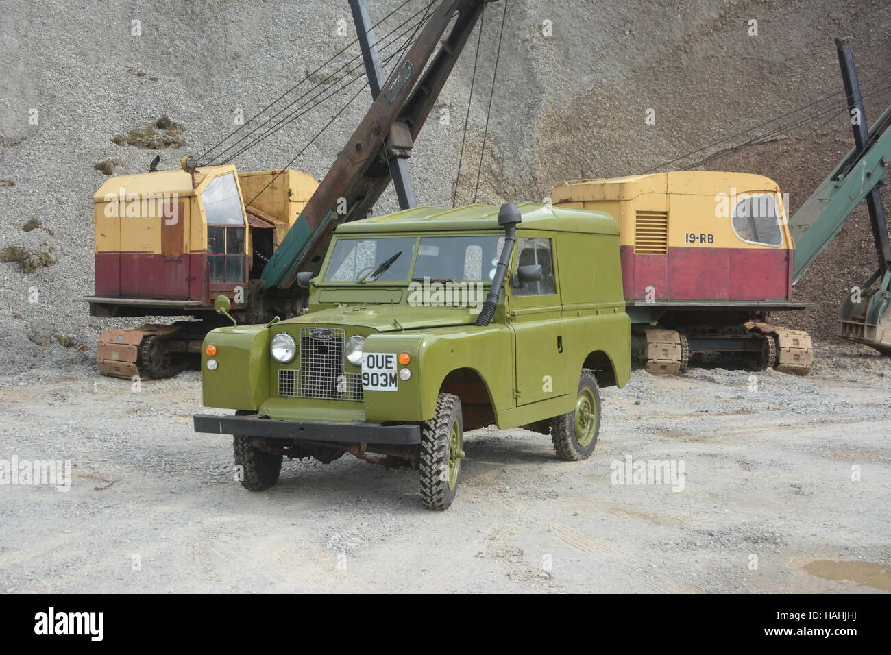 Classic Land rover in front of cranes in a quarry Lake district Stock ...