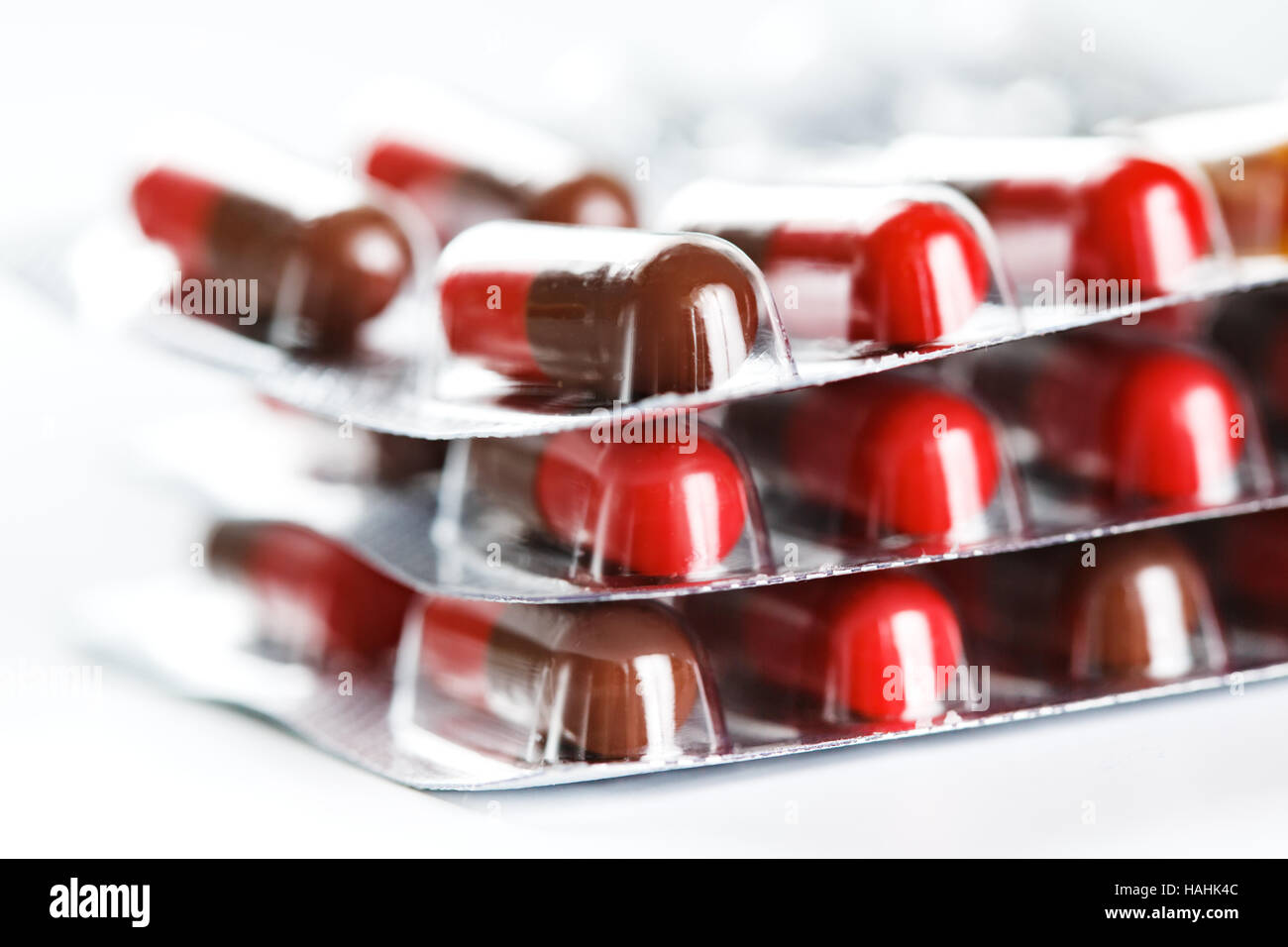 Blisters with red gelatin capsules, selective focus Stock Photo - Alamy