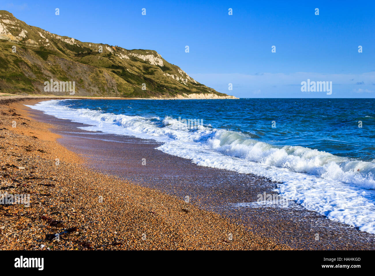 Look east along the shingle beach towards Burning Cliff at Ringstead ...
