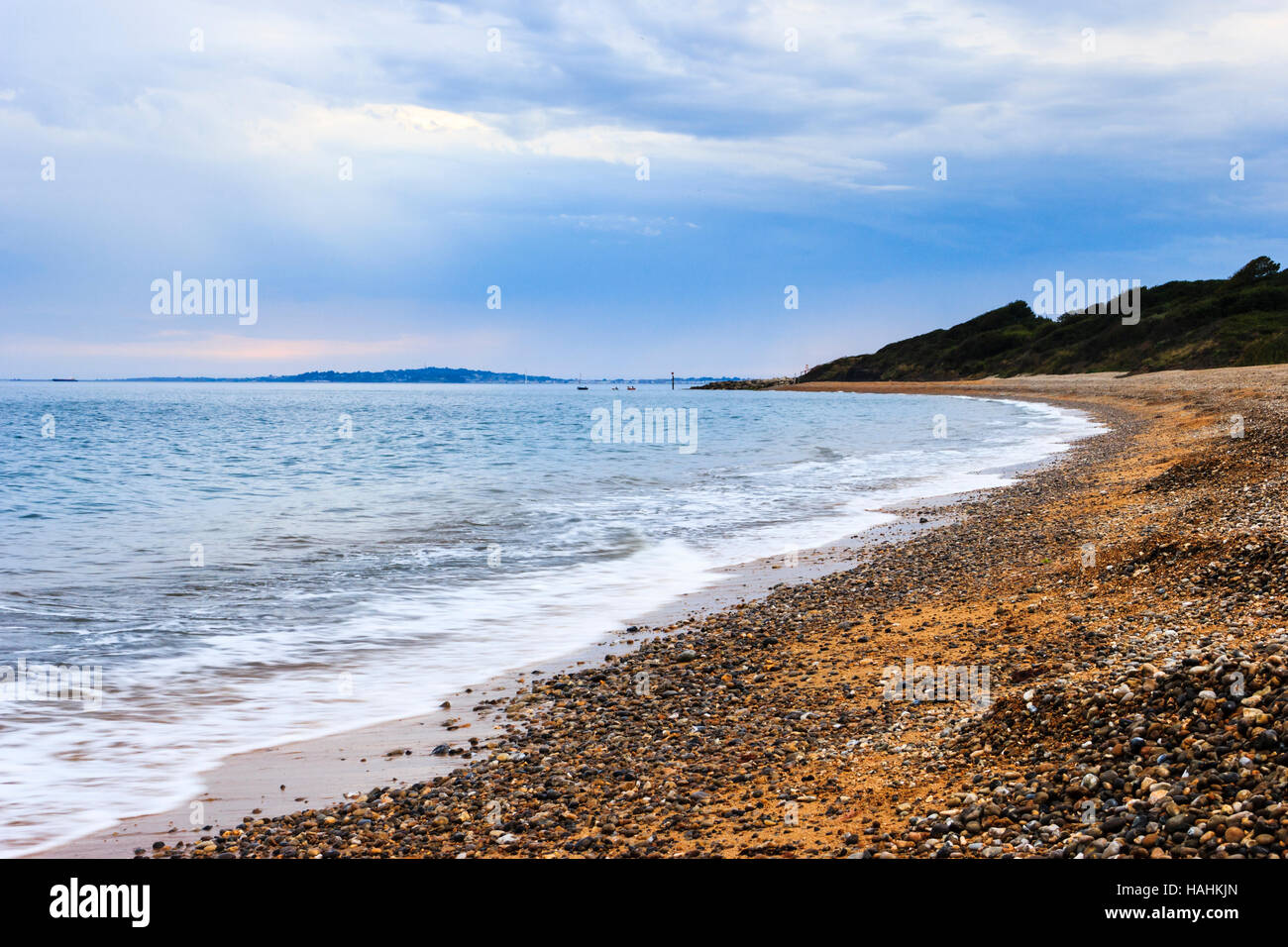 Looking west along the shingle beach at Ringstead Bay, Dorset, England ...