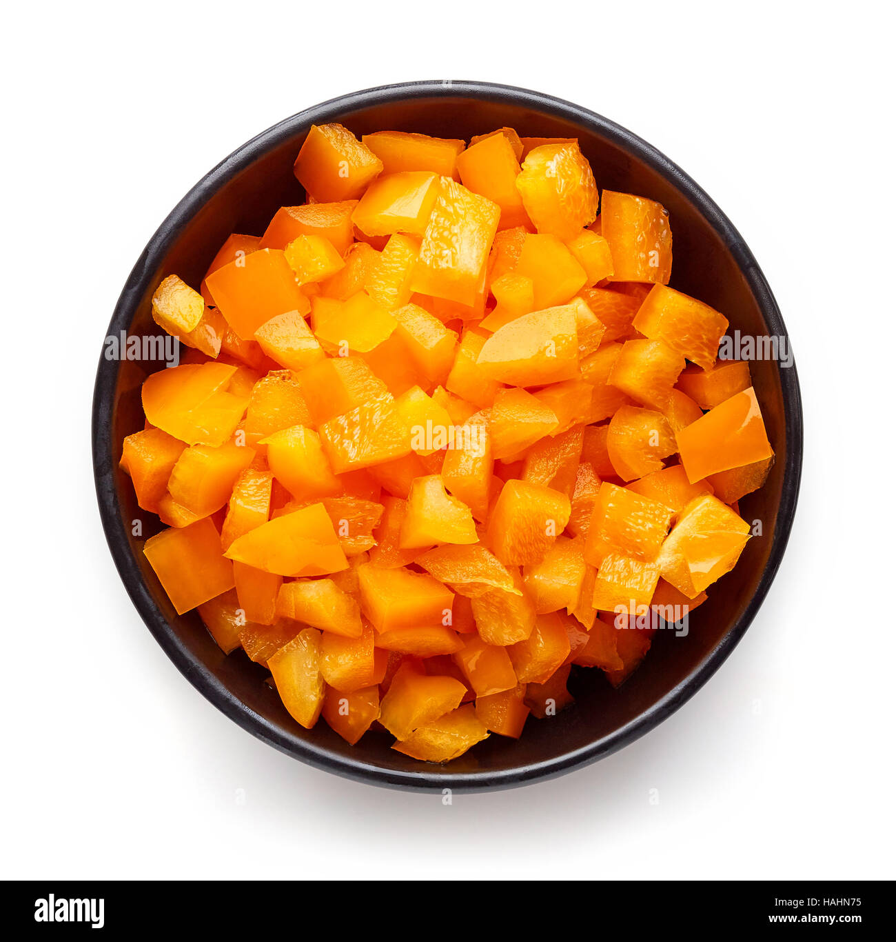 Bowl of chopped bell pepper isolated on white background, top view ...