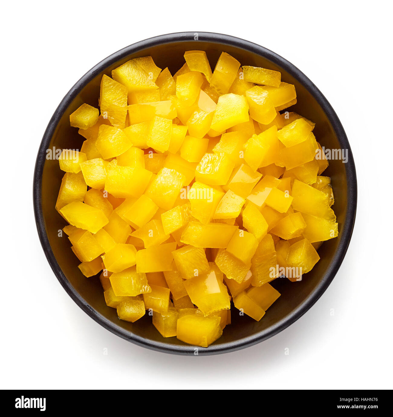 Bowl of chopped bell pepper isolated on white background, top view ...