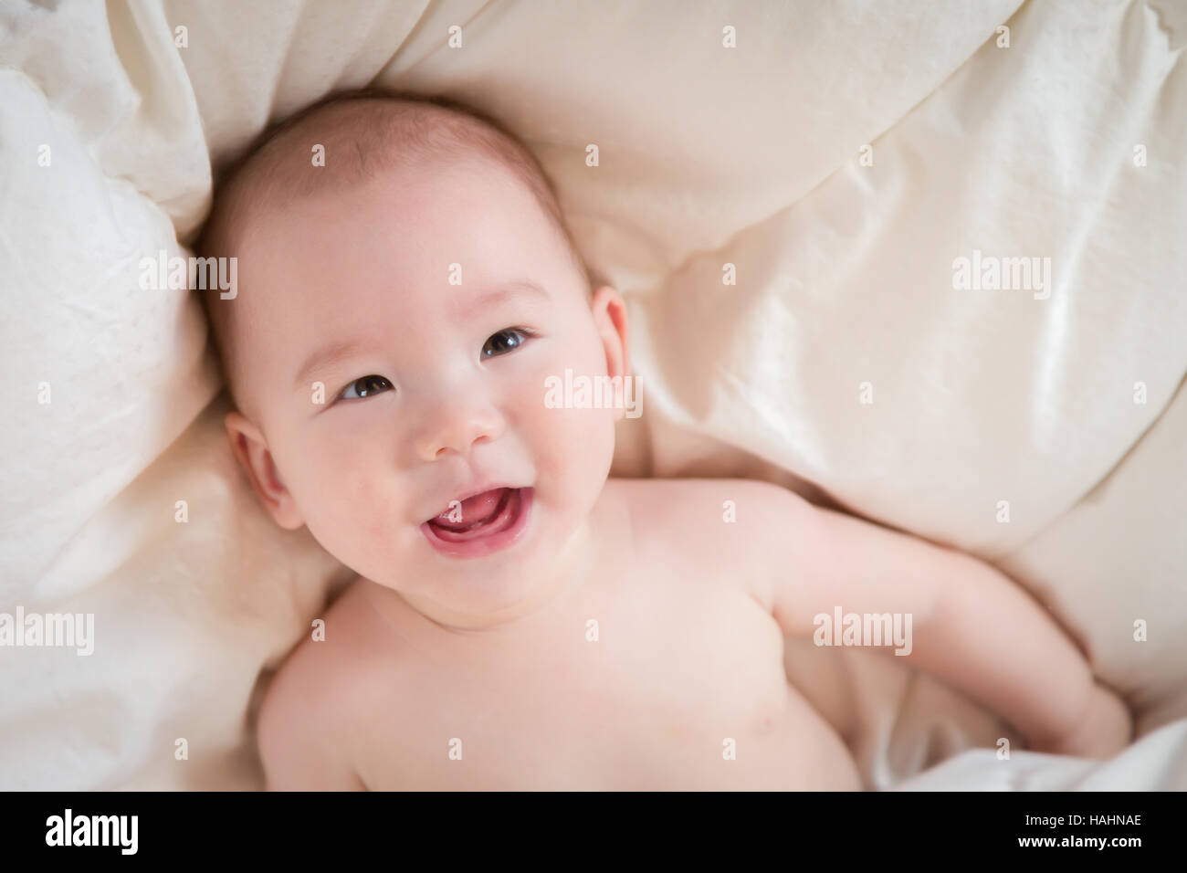Young Mixed Race Chinese and Caucasian Baby Boy Having Fun on His ...