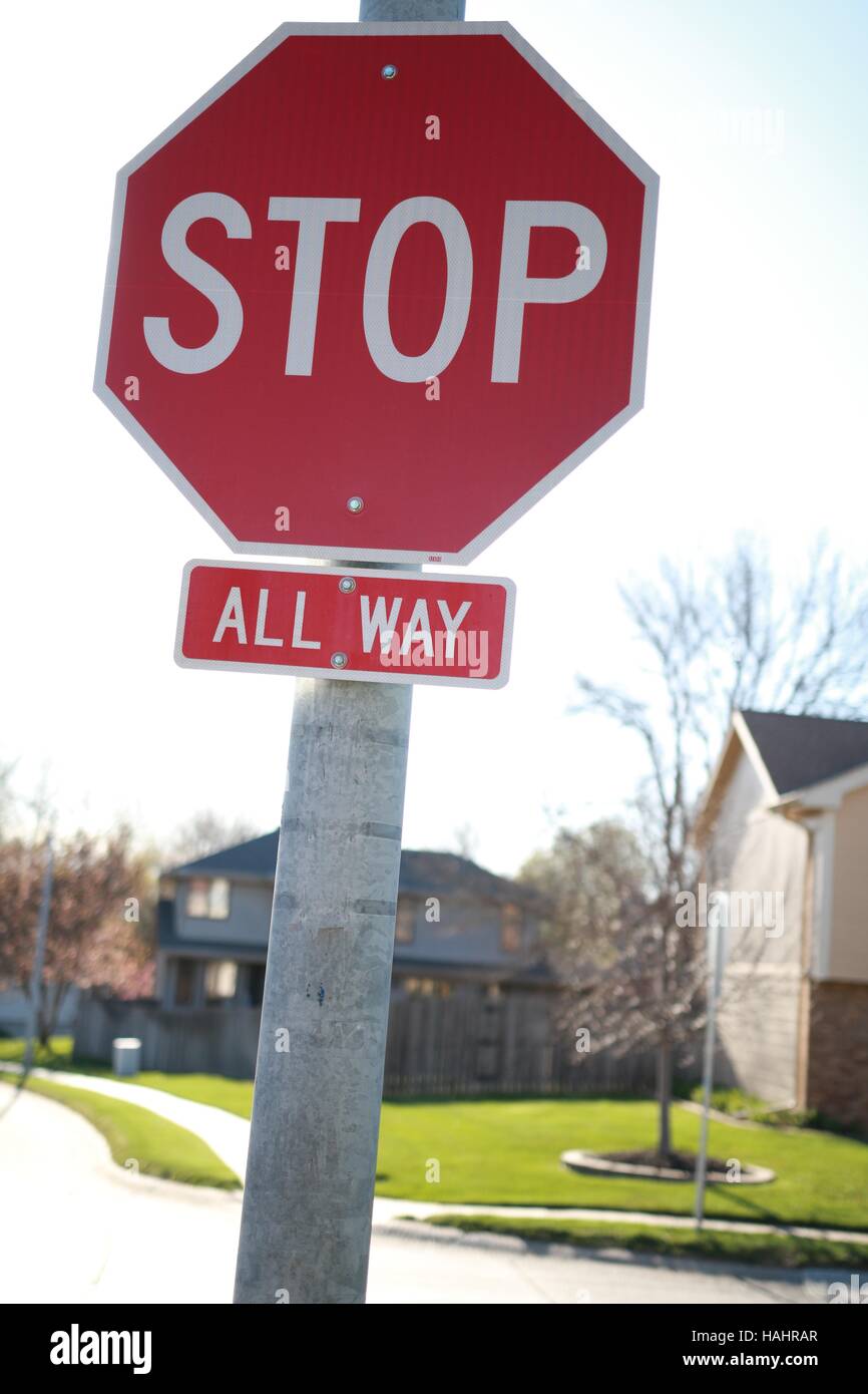 stop sign at the end of the block Stock Photo - Alamy