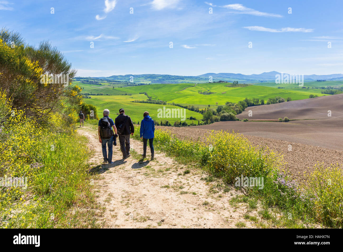 People on a hiking trail in Tuscany with landscape view in spring Stock ...