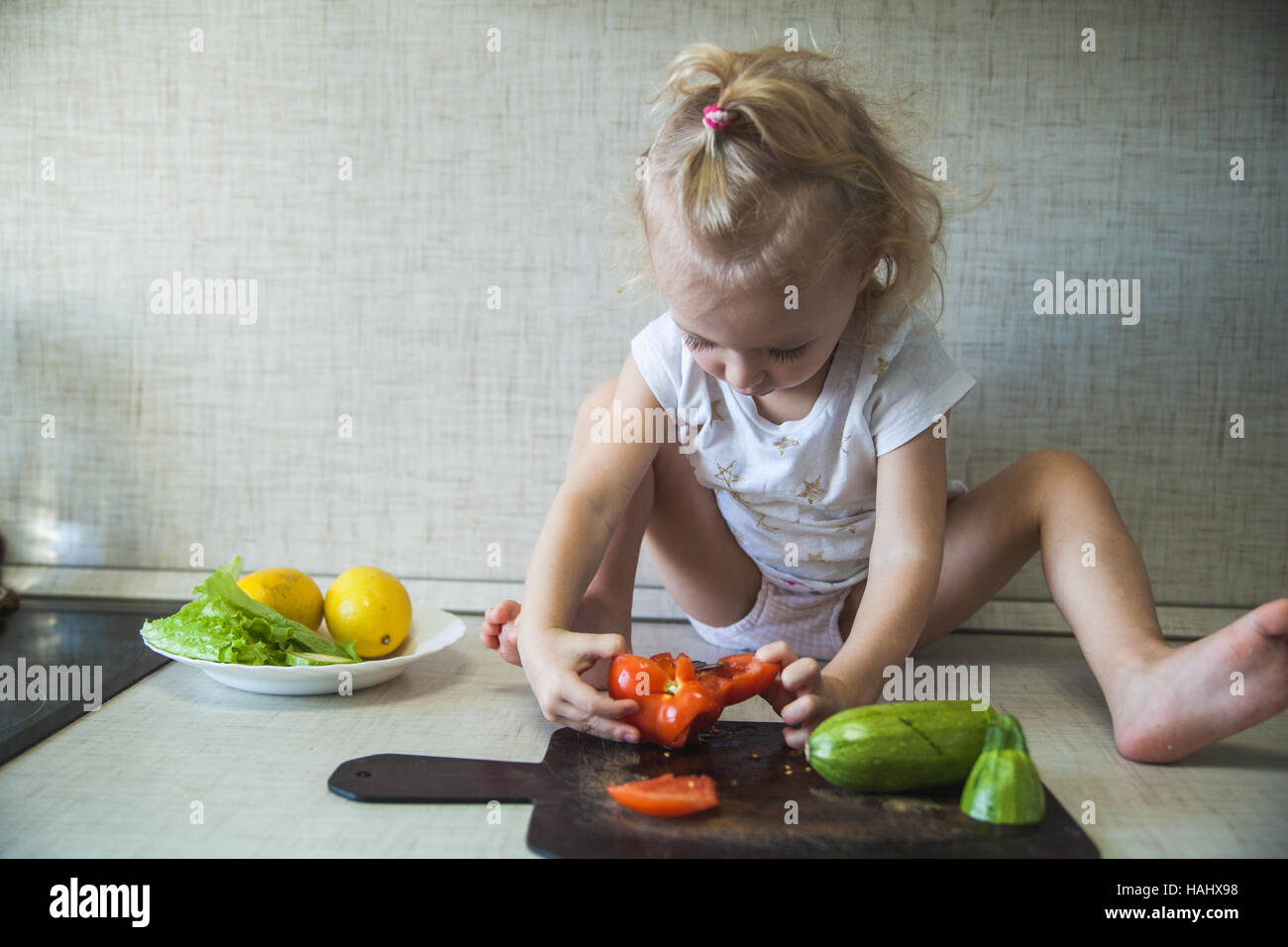 little girl cooking food Stock Photo - Alamy