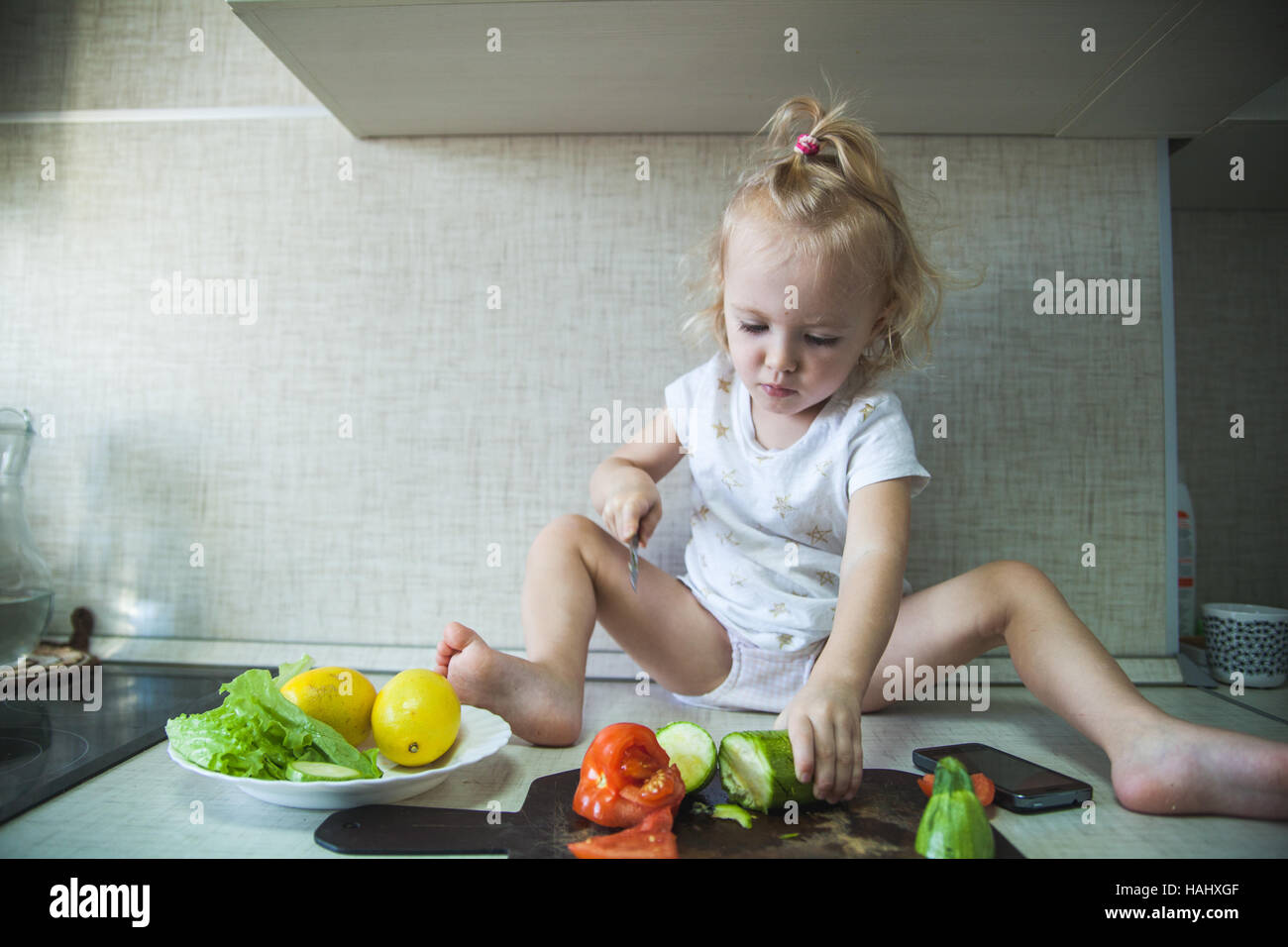 little girl cooking food Stock Photo - Alamy