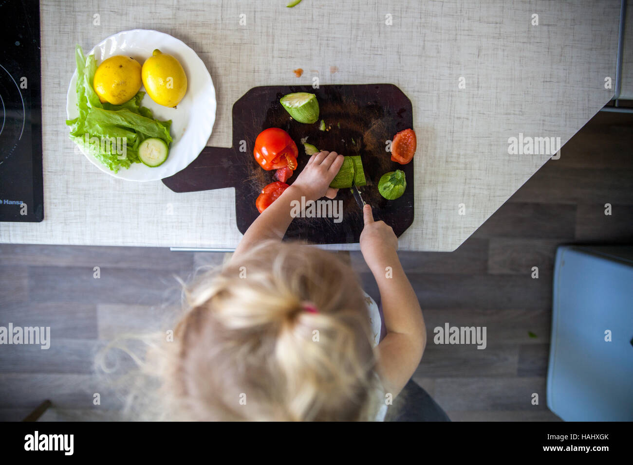 little girl cooking food Stock Photo - Alamy