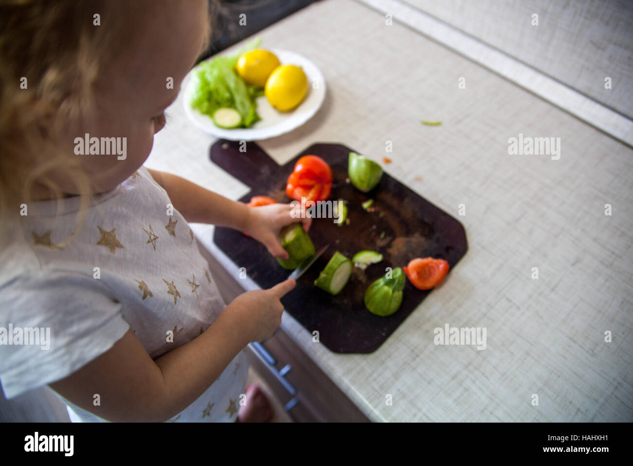 little girl cooking food Stock Photo - Alamy