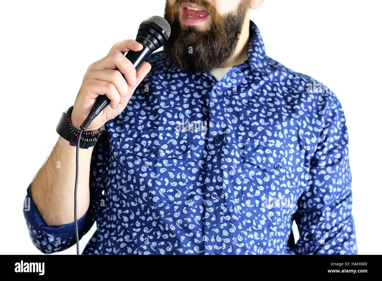 microphone on stage hand hold Stock Photo - Alamy