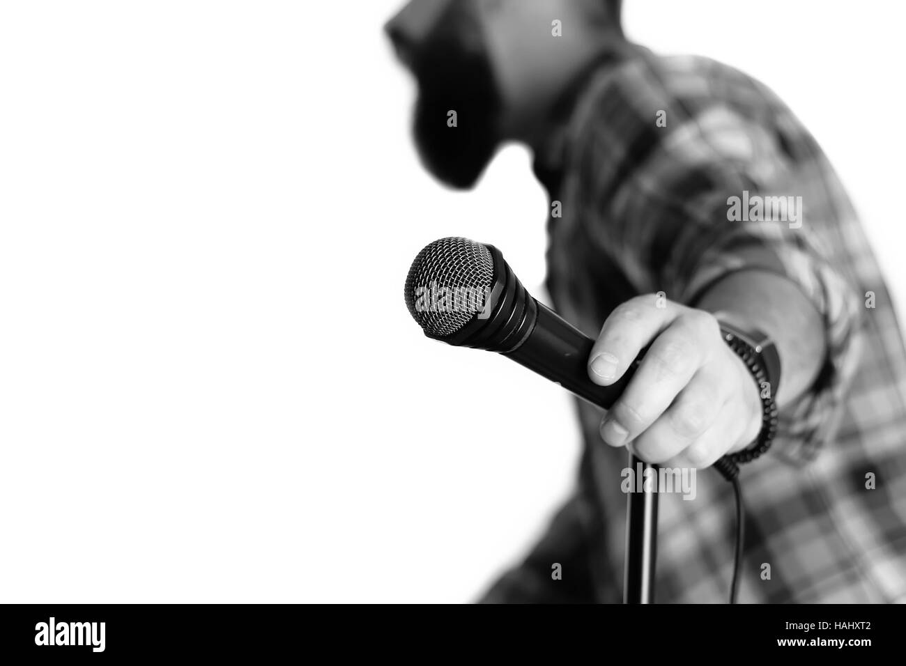 Microphone isolated man hand Stock Photo - Alamy