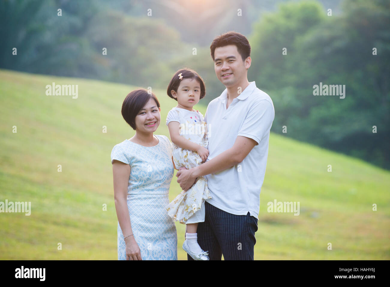 Happy Asian Family enjoying family time together in the park Stock ...