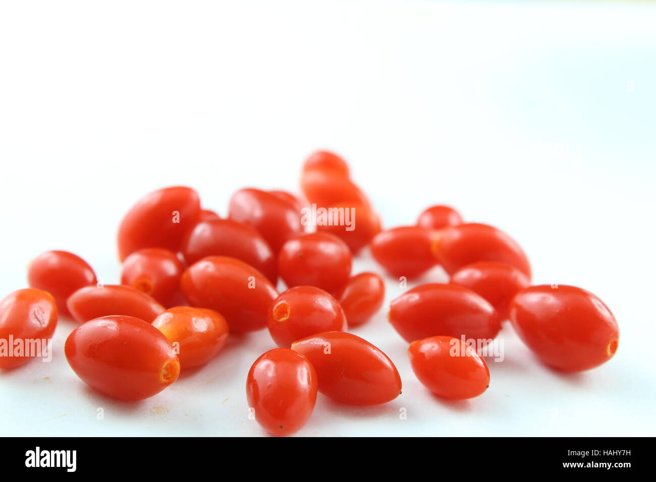 fresh goji berries isolated Stock Photo - Alamy