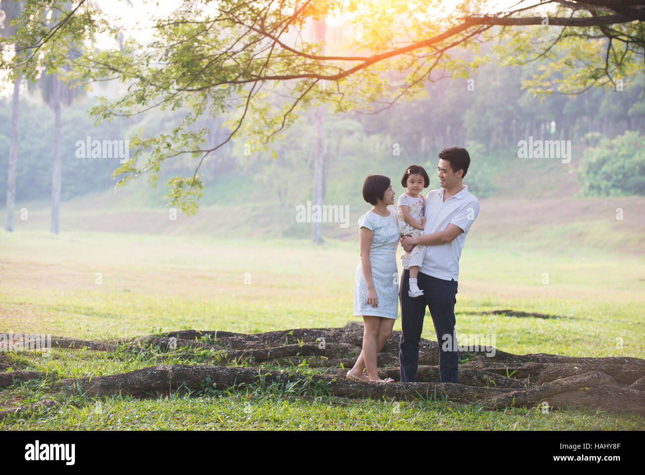 Happy Asian Family enjoying family time together in the park Stock ...
