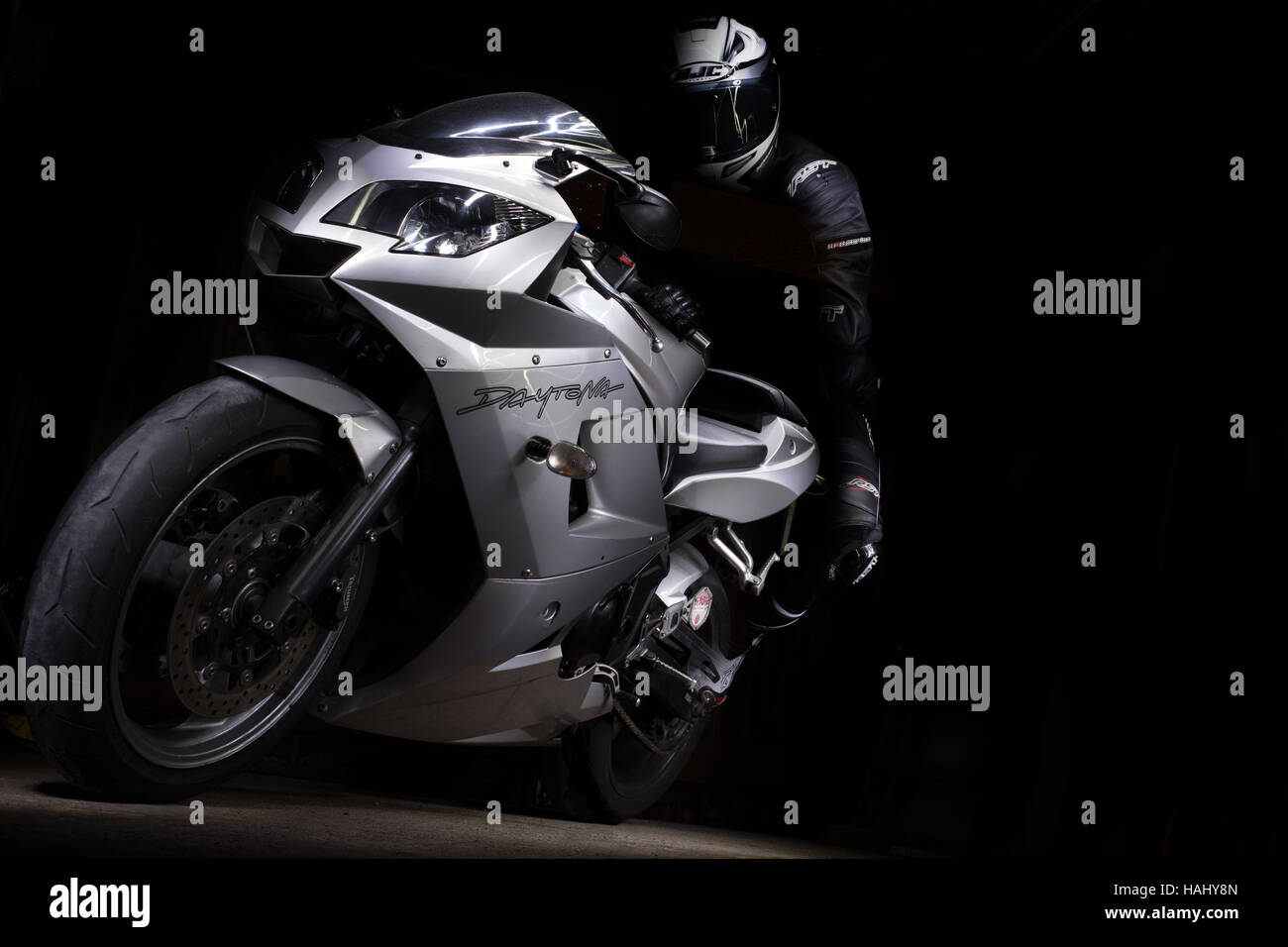 Biker riding motorcycle low angle hi-res stock photography and images ...