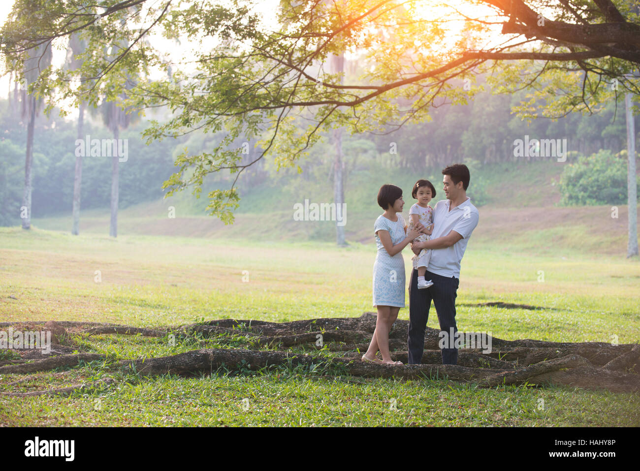 Happy Asian Family enjoying family time together in the park Stock ...